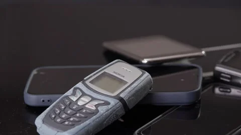different generations of cell phones and... | Stock Video | Pond5
