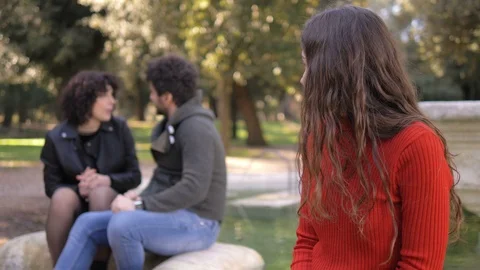 different moods: sad woman observing hap... | Stock Video | Pond5