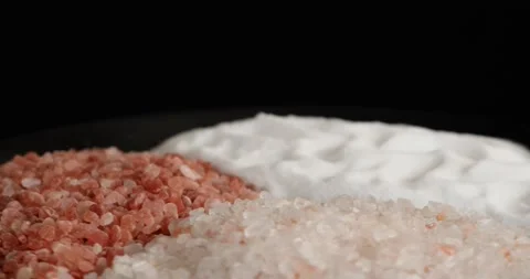 Different salt types rotating on black b... | Stock Video | Pond5