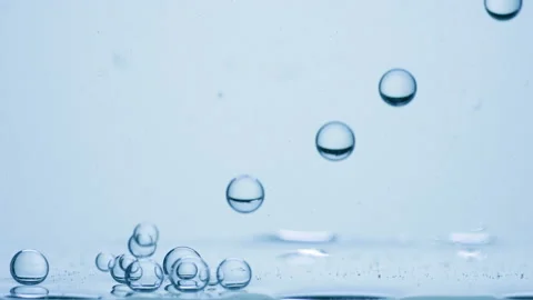 Different sized bubbles go down to surfa... | Stock Video | Pond5