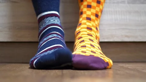 Different socks as symbol of down syndro... | Stock Video | Pond5