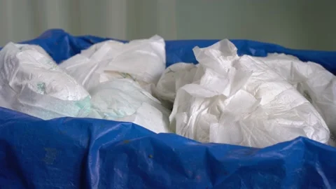 Dirty baby diapers in the trash. Disposi... | Stock Video | Pond5