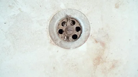 Dirty bathroom drain clogged with hair a... | Stock Video | Pond5