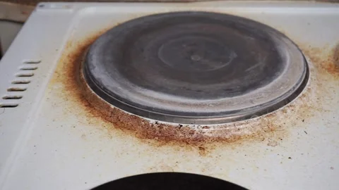 Dirty electric stove. Grease spots. Clea... | Stock Video | Pond5