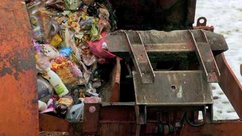 Dirty Garbage Truck Compresses Junk Insi... | Stock Video | Pond5