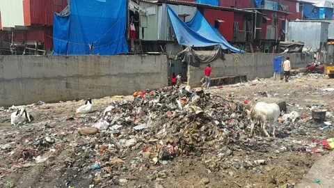 Dirty Slum Place with huge garbage in Mu... | Stock Video | Pond5