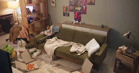 Dirty, untidy and messy living room in h... | Stock Video | Pond5