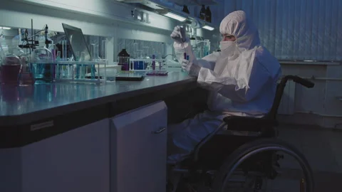 Disabled Female Scientist in Wheelchair ... | Stock Video | Pond5