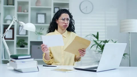 Disappointed female student reading lett... | Stock Video | Pond5