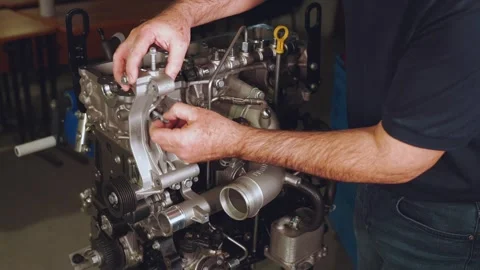Disassembly of a car engine, the master ... | Stock Video | Pond5