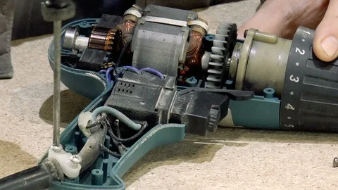 Disassembly of electric drills | Stock Video | Pond5