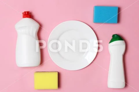 Photograph: Dishwashing liquid close-up on a colored background #153118147