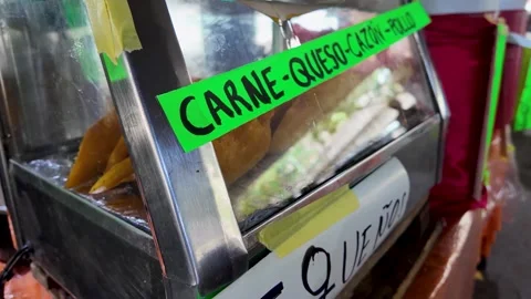 Display case with empanadas of carne, qu... | Stock Video | Pond5