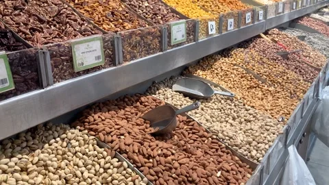 Display case with nuts, many types, pist... | Stock Video | Pond5