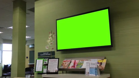 Display tv with a green screen inside th... | Stock Video | Pond5