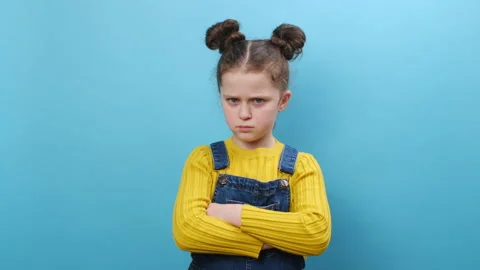 Displeased upset little kid girl holding... | Stock Video | Pond5