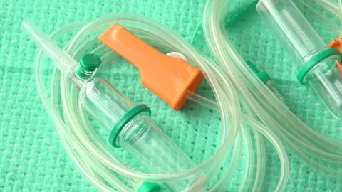 Disposable infusion set on green backgro... | Stock Video | Pond5