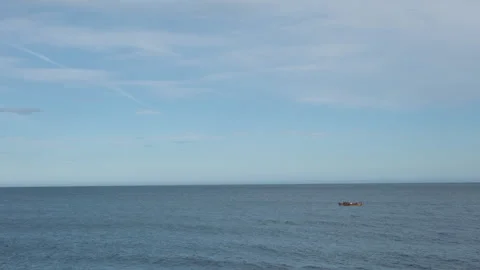 Distant View Of Sailing Boat In Serene O... | Stock Video | Pond5