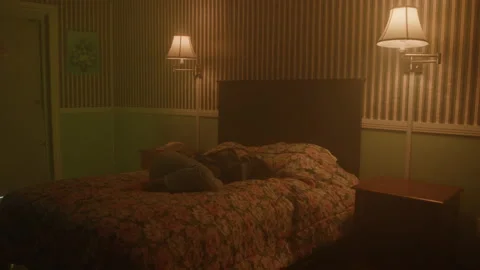 Disturbed Woman Laying On Bed In Creepy ... | Stock Video | Pond5