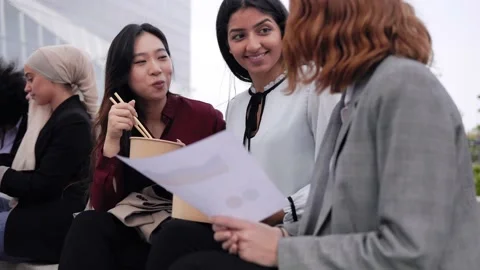 Diverse group of business women eating t... | Stock Video | Pond5