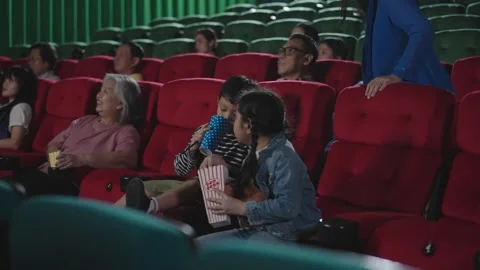 Diverse group of people sitting on seats... | Stock Video | Pond5