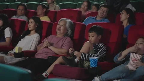 Diverse group of people sitting on seats... | Stock Video | Pond5