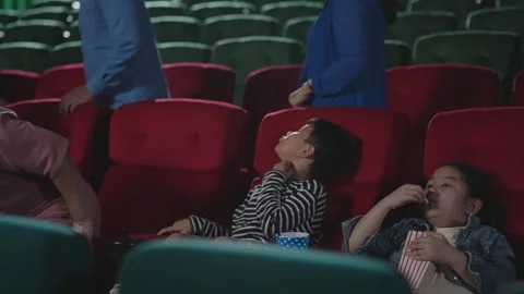 Diverse group of people sitting on seats... | Stock Video | Pond5