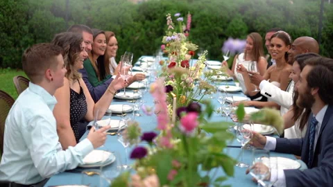 Diverse group of wedding guests laughing... | Stock Video | Pond5