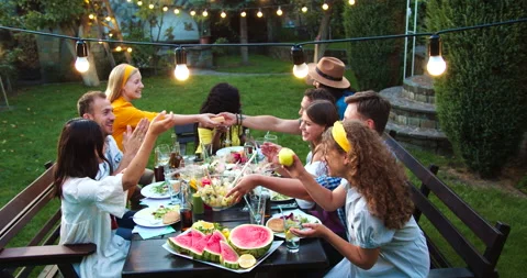 Diverse mixed races young people eating ... | Stock Video | Pond5