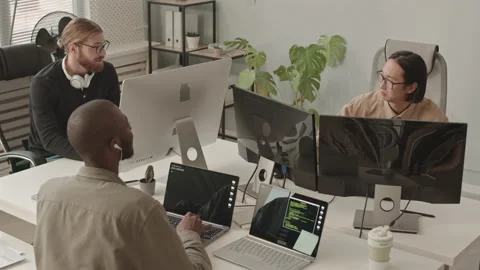Diverse Team of Programmers Working on C... | Stock Video | Pond5