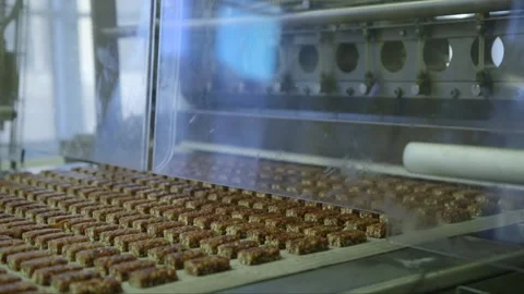 divided mass of candy filling on a conve... | Stock Video | Pond5