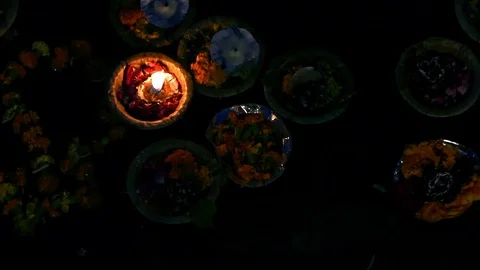 Diya floating in water of Ganges in Vara... | Stock Video | Pond5