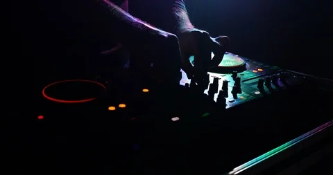 DJ Spinning, Mixing, and Scratching in a... | Stock Video | Pond5