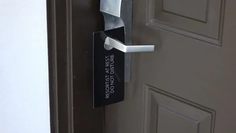 Do not disturb door sign in slow motion | Stock Video | Pond5
