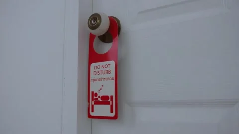 Do not disturb sign. Hand hangs red do n... | Stock Video | Pond5