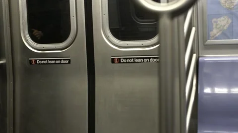 Do not lean on Door sign on NYC Subway D... | Stock Video | Pond5