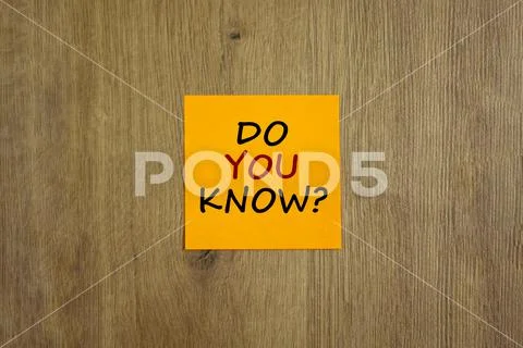 Photograph: Do you know symbol. Yellow sheet of paper. Words 'do you ...