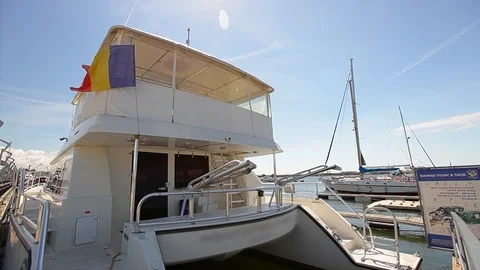 Docked Catamaran Stern at Pier | Stock Video | Pond5