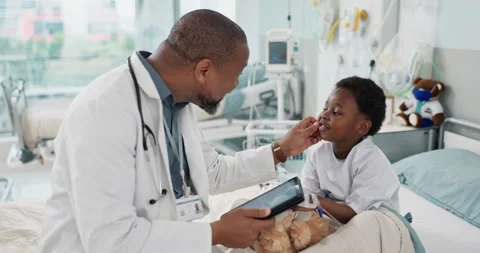 Doctor, African boy kid and hospital wit... | Stock Video | Pond5