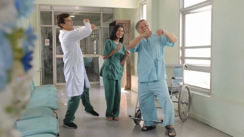Doctor and patient dance together at hos... | Stock Video | Pond5