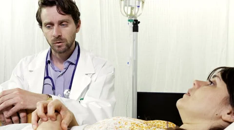 Doctor giving bad news to female patient... | Stock Video | Pond5