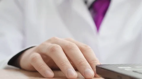 Doctor knocking fingers on the table | Stock Video | Pond5