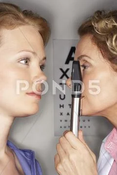 Doctor Performing Eye Test - Stock Image - Everypixel