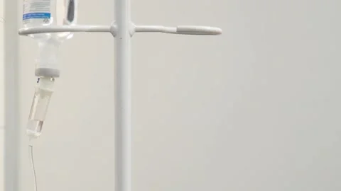 Doctor prepares the system with a droppe... | Stock Video | Pond5