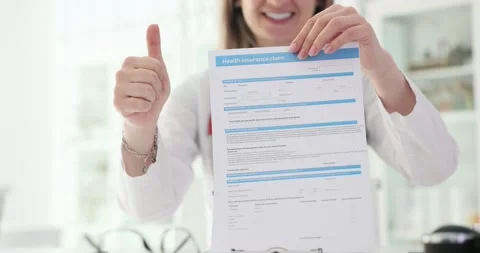 Doctor shows health insurance claim and ... | Stock Video | Pond5