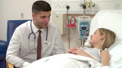 Doctor Talking With Young Girl In Hospit... | Stock Video | Pond5