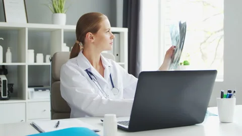 Doctor Works in the Medical Office. Woma... | Stock Video | Pond5