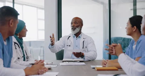Doctors, black man with leader in meetin... | Stock Video | Pond5