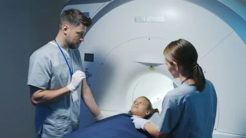 Doctors Explaining MRI Procedure Process... | Stock Video | Pond5