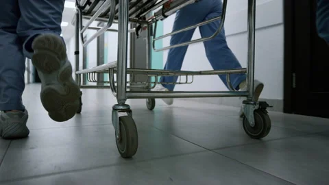 Doctors feet running down hospital corri... | Stock Video | Pond5